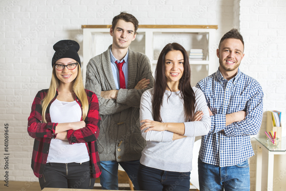 Attractive people with folded arms Stock-Foto | Adobe Stock