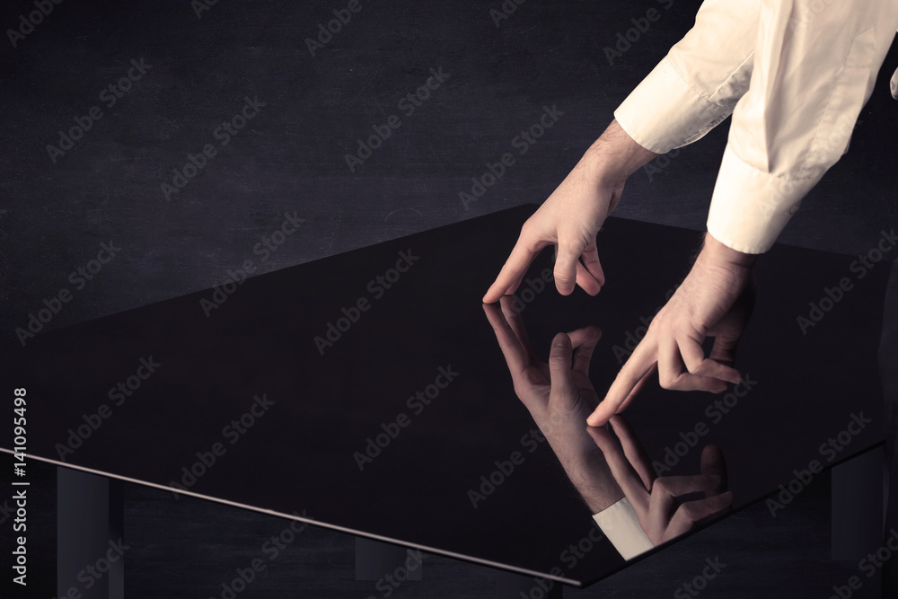 Close up of a hand touching smart table with copy space Stock 写真 ...