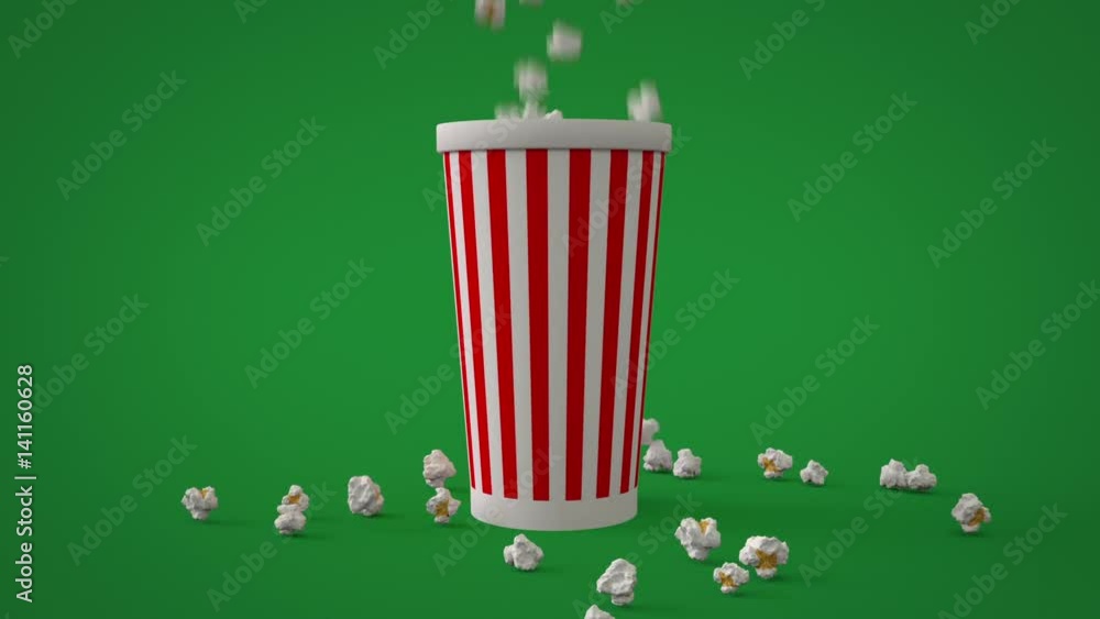 Vidéo Stock Popcorn falling down and filling striped paper cup packing ...