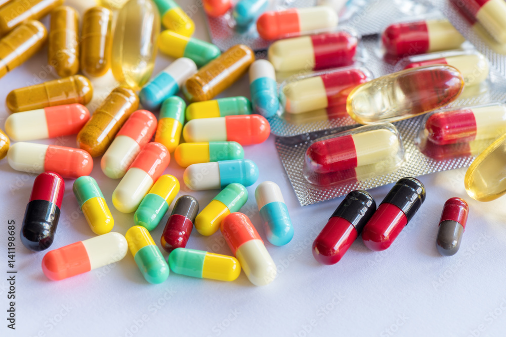Multicolor capsule pills background Stock-Foto | Adobe Stock