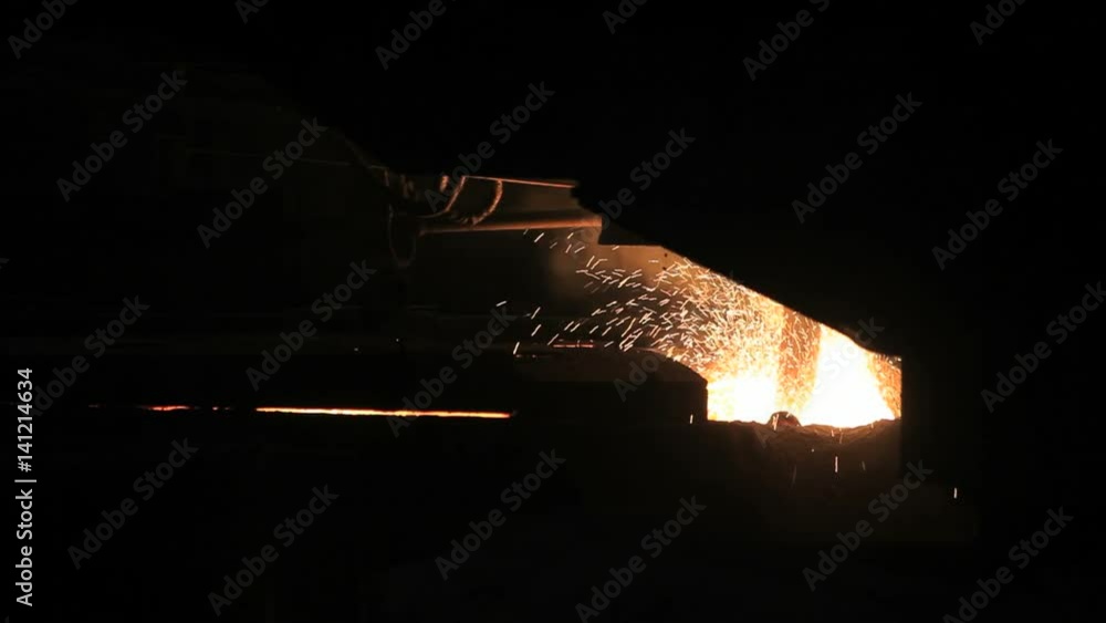 Metal sparks from hot metal. Molten steel sparks. Iron and steel ...