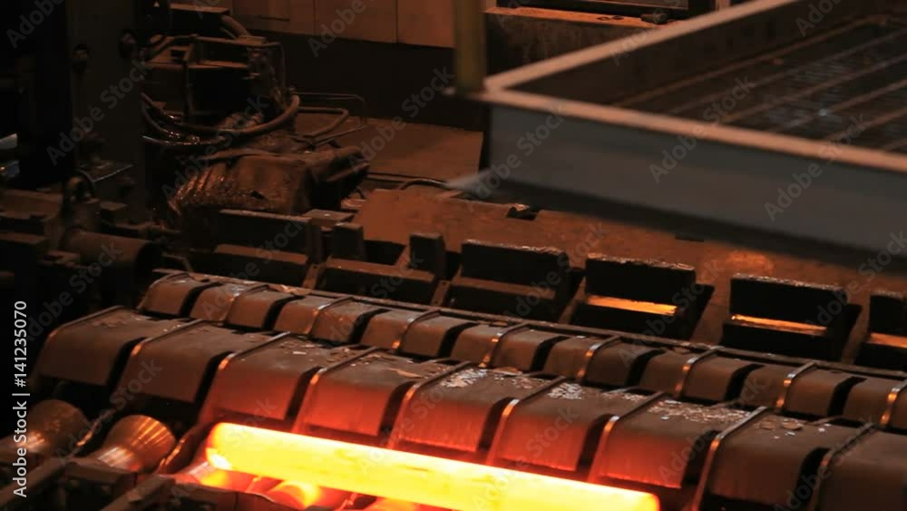 Manufacturing process of metal pipe on production line at metal factory ...