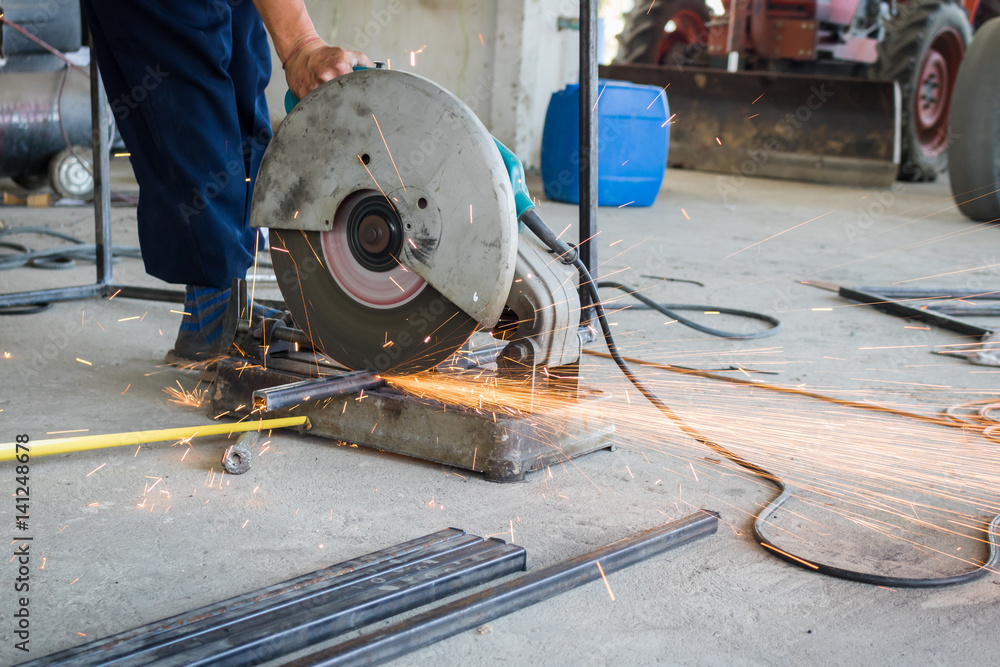 Mechanic use cut off saw machine cutting steel unsafe on protection ...