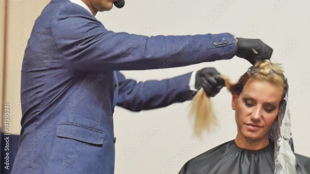 Hairdresser In Action. Barber and customers. hairstyle models for white ...