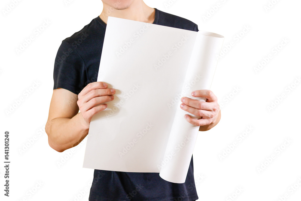 Guy holds in his hands twisted up in paper. Opens the package of paper ...