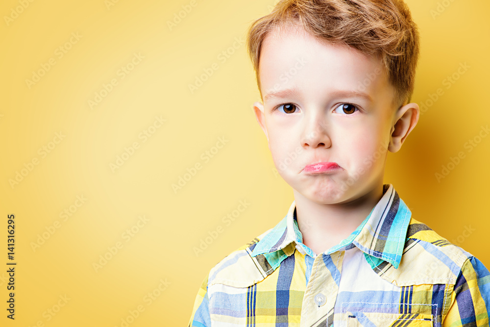 kid makes faces Stock Photo | Adobe Stock