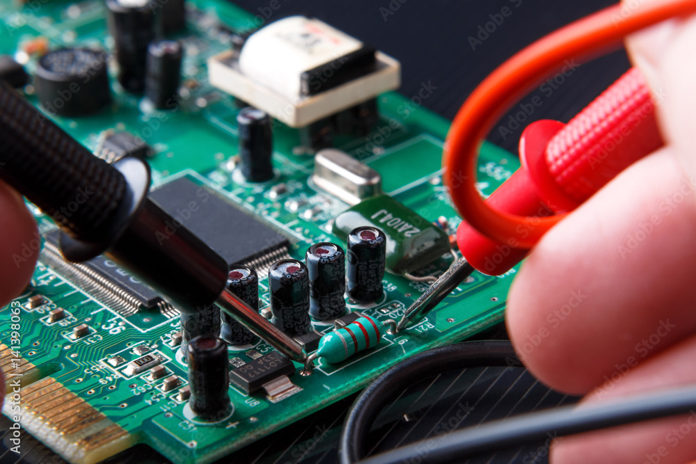 Repair and diagnostic of electronic circuit board Stock Photo | Adobe Stock