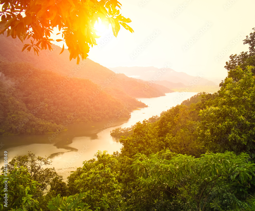 Beautiful mountain river in sunset soft light, forest trees around ...