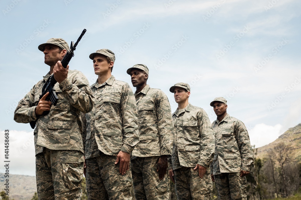 Group of military soldiers standing in line Stock 写真 | Adobe Stock