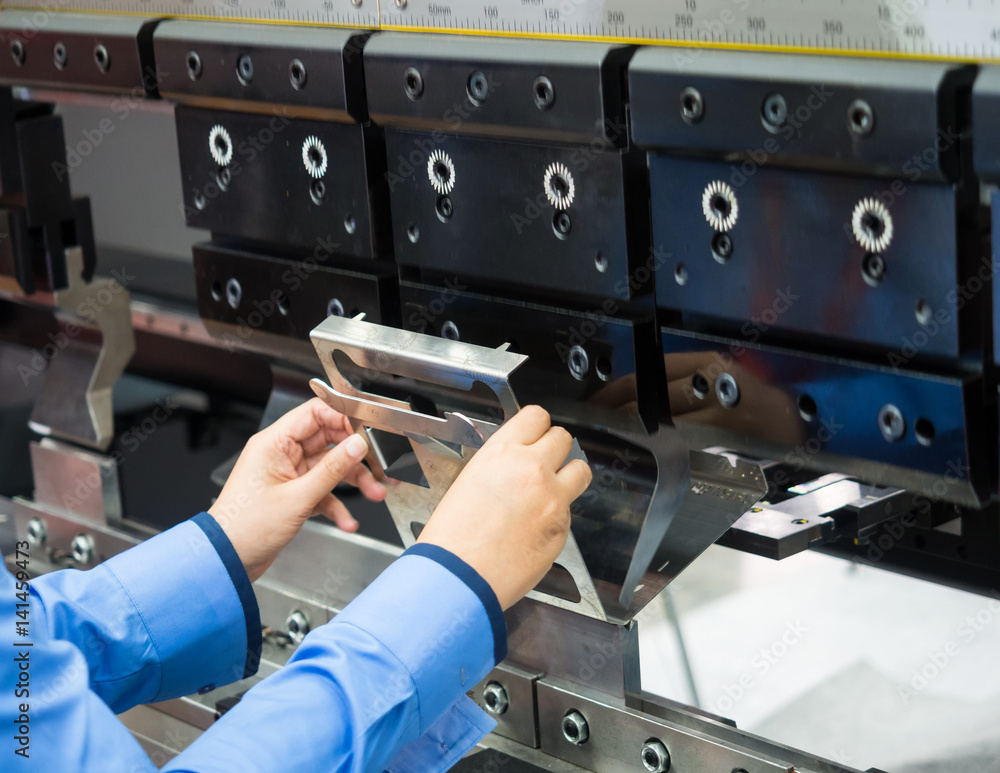 operator bending metal sheet by sheet bending machine Stock Photo ...