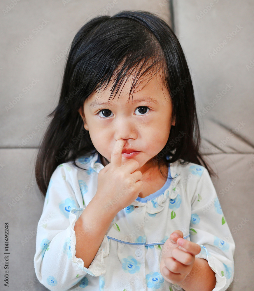 Portrait of child girl with snot flowing from her nose Stock Photo ...