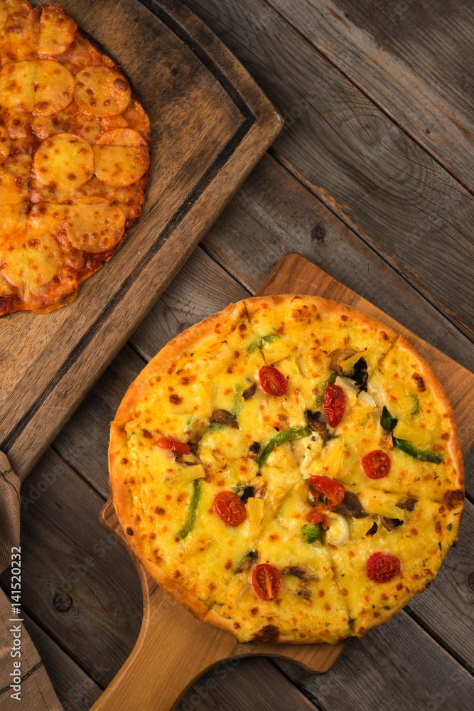 pizza top view in rustic setting Stock Photo | Adobe Stock