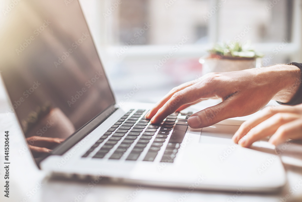 Student learning at coffee shop and using laptop, Businessman working ...