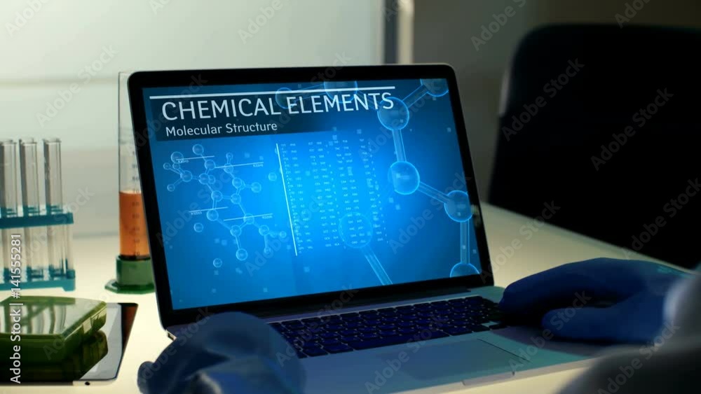 Bio Scientist using computer in his modern laboratory. Men's hands ...