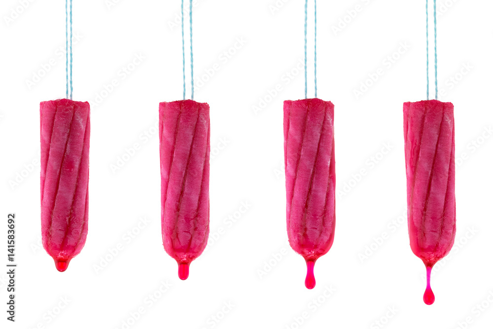 4 New unused tampon hanging with dripping red syrup liquid drop that ...