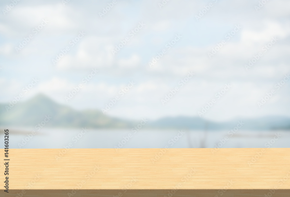 Laminate table top on blurred mountains landscape background can put or ...