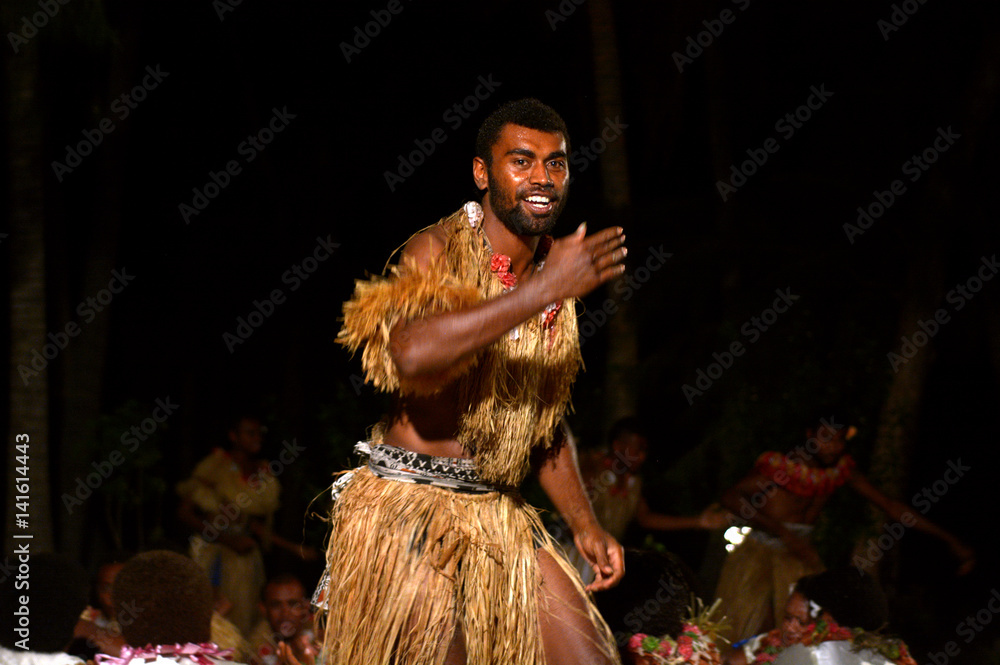 Fijian men dancing a traditional male dance meke wesi in Fiji Stock ...