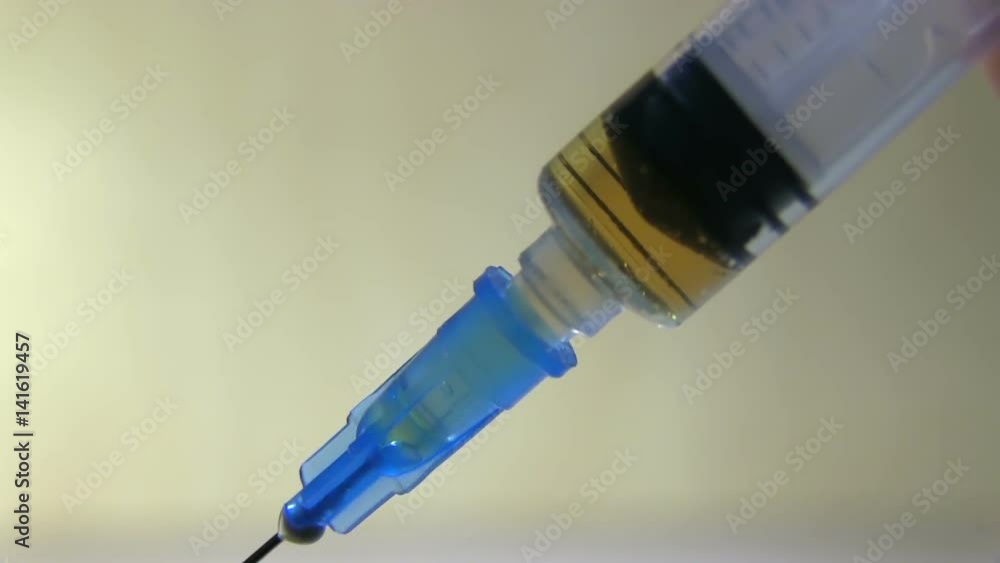 Doctor Is Making Injection. Liquid Substance In Syringe. Medical ...