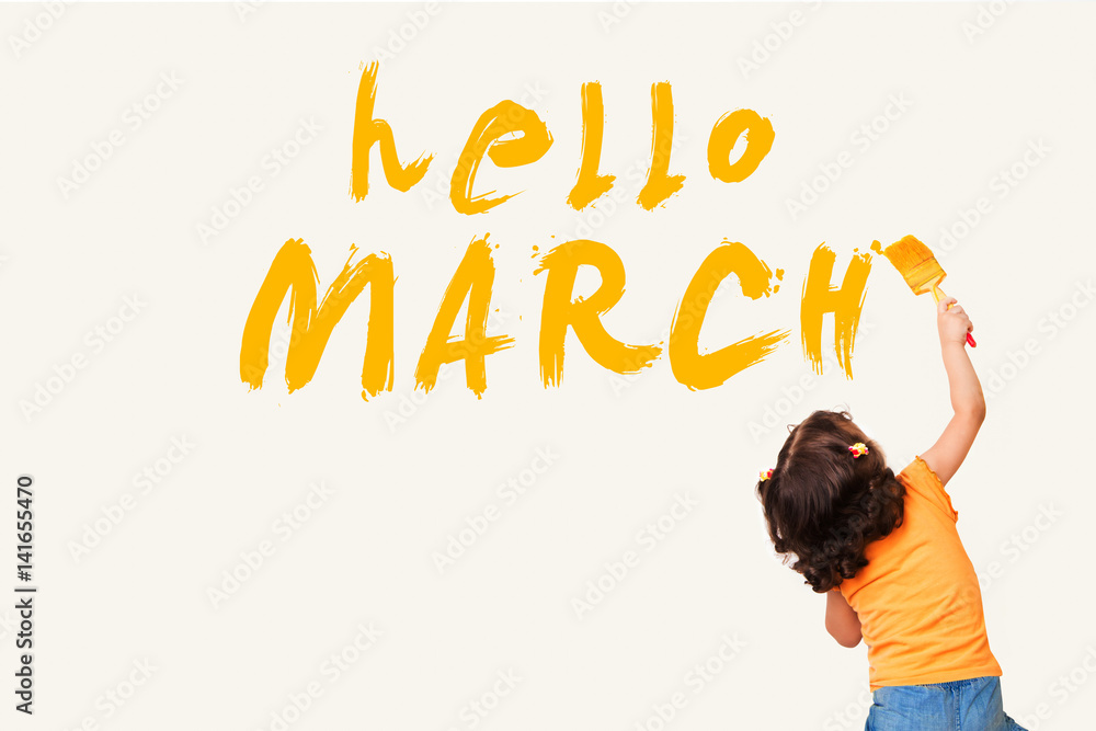 Cute little girl drawing : hello MARCH with painting brush on wall ...