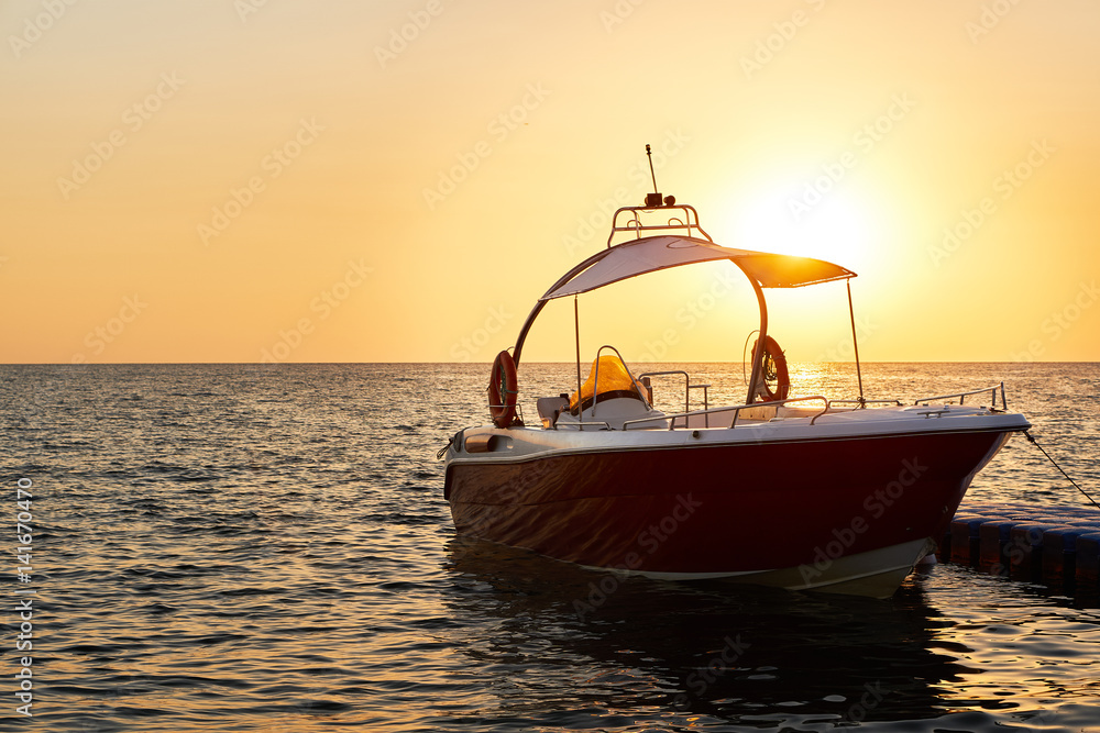 Sea bay with yacht at the sunset. Stock Photo | Adobe Stock