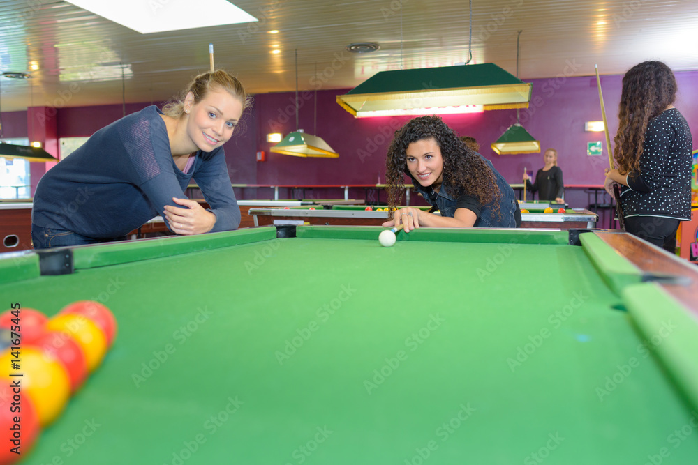 girls shooting pool Stock Photo | Adobe Stock