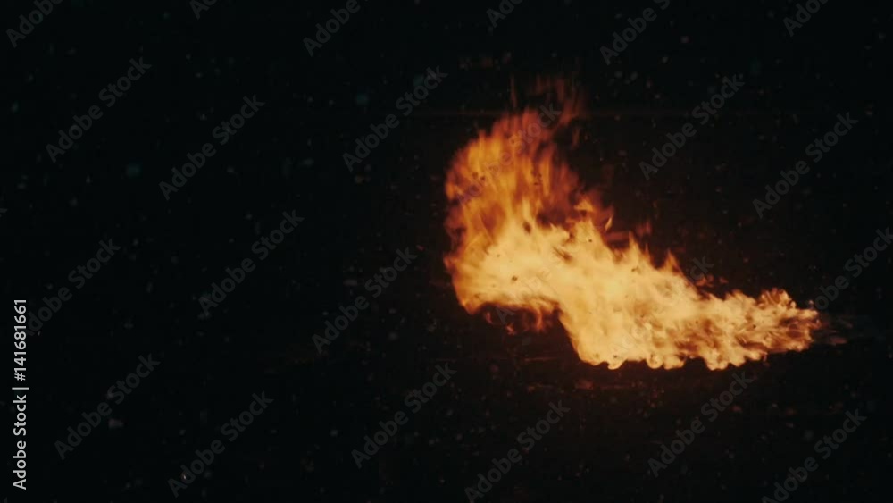 Flame fire blow on dark background. Blowing fire flame on night ...