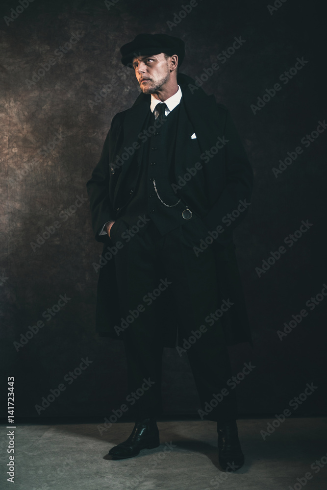 Retro 1920s english gangster. Peaky blinders style. Stock Photo | Adobe ...