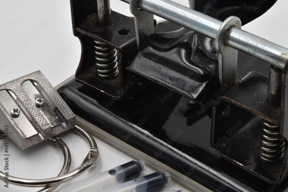 Foto de Concept for old office tools: hole puncher, ink for fountain ...