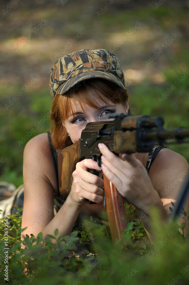 Beautiful girl in the woods with a machine gun Kalashnikov ภาพถ่ายสต็อก ...