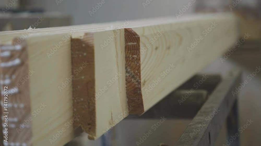 Production of laminated veneer lumber: mechanized production. Planing ...