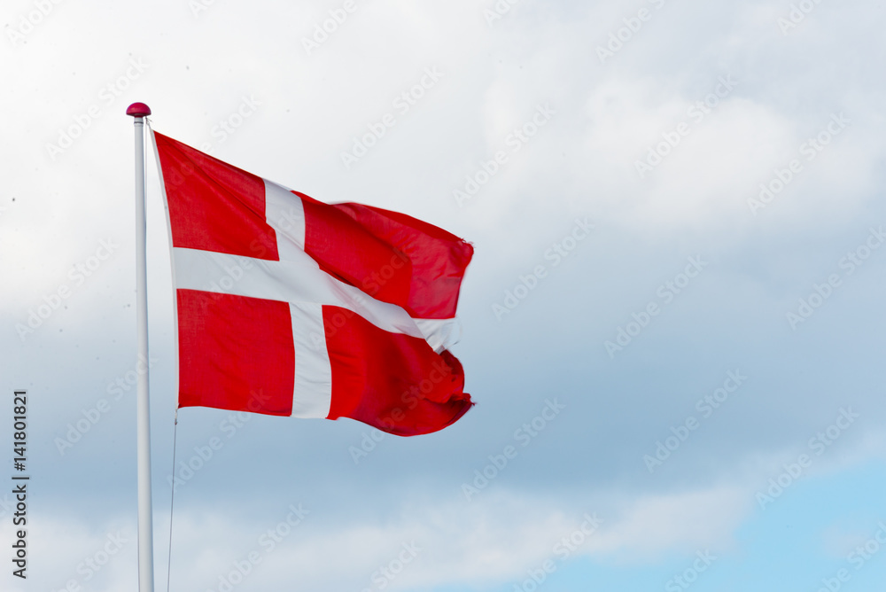 Foto de danebrog - flying danish flag do Stock | Adobe Stock