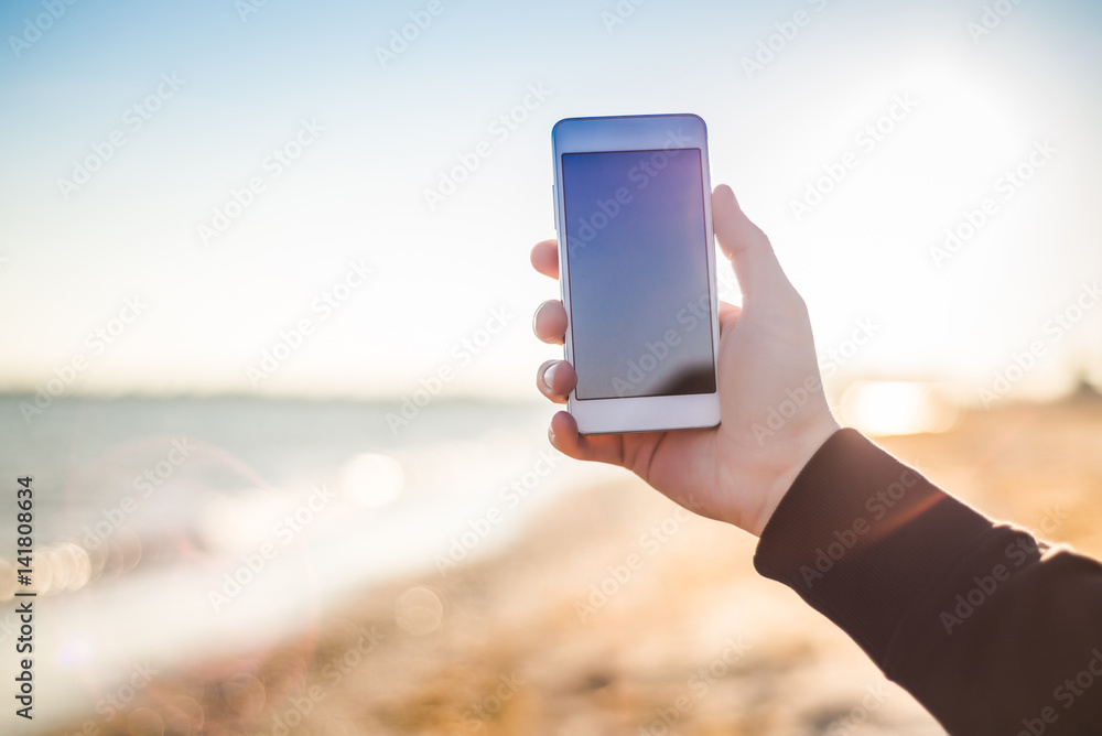Hand holding phone close-up Stock Photo | Adobe Stock