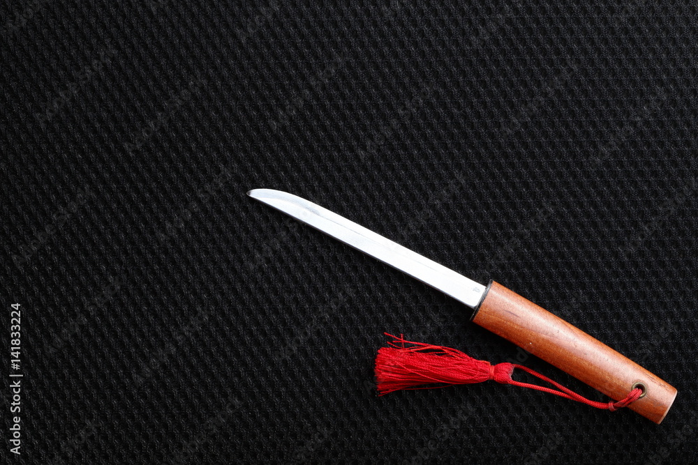 The miniature model of japanese sword represent the ancient weapon and ...