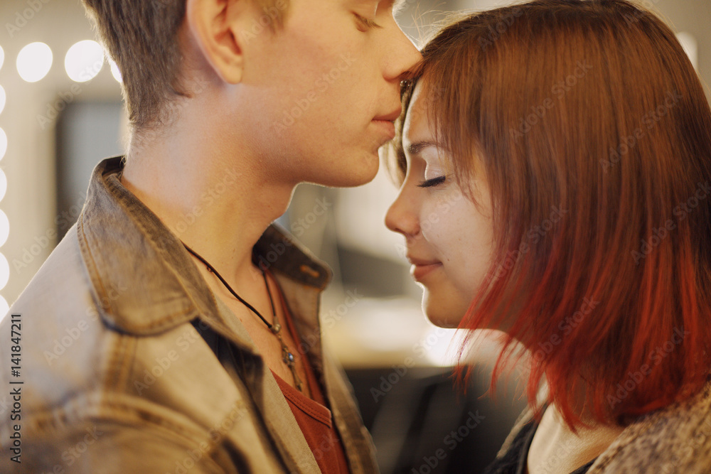 Romantic couple touching and kissing each other Stock Photo | Adobe Stock