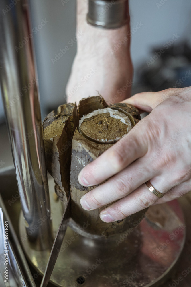 Civil engineer preparing a soil sample for a laboratory test in order ...