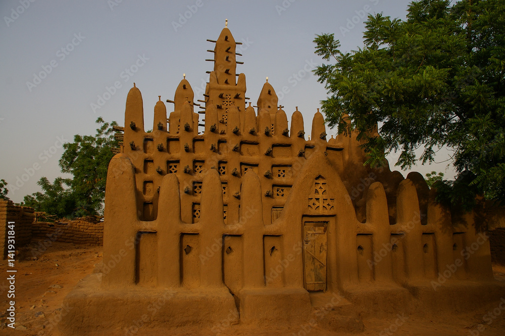 Photo & Art Print Mud Mosque in the evening in Teli village, Dogon ...