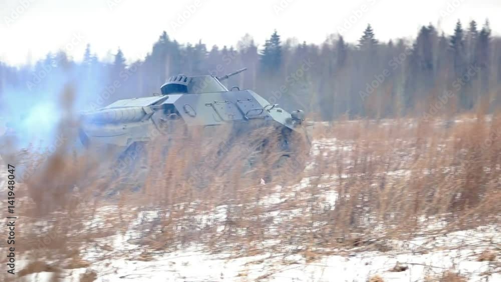 Infantry fighting vehicle moves through the snow. Stock-Video | Adobe Stock