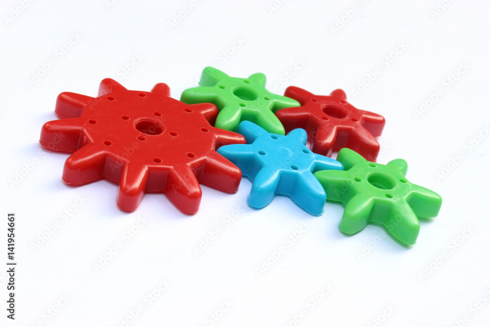 Colorful Plastic Cogs / Gears Stock Photo | Adobe Stock