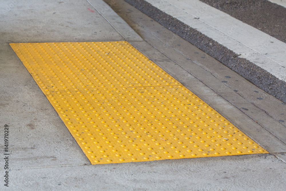Tactile paving with textured ground surface with markings, indicators ...