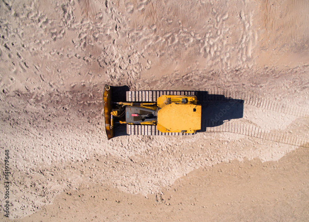 Top-down Aerial Photo of Bulldozer on the Beach Stock Photo | Adobe Stock