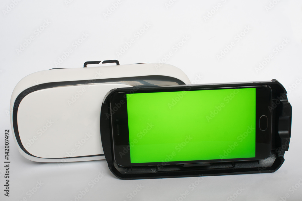 for key chroma Virtual reality, VR, helmet and smartphone with green ...