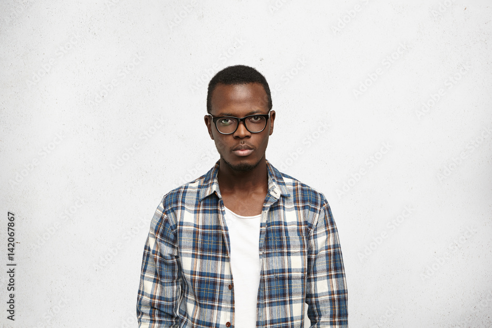Closeup portrait of handsome, smart and self-confident young black male ...
