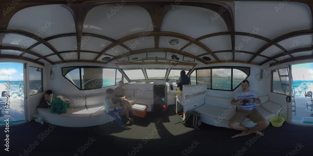 360 VR video. Inside view of sailing yacht with family and captain ...