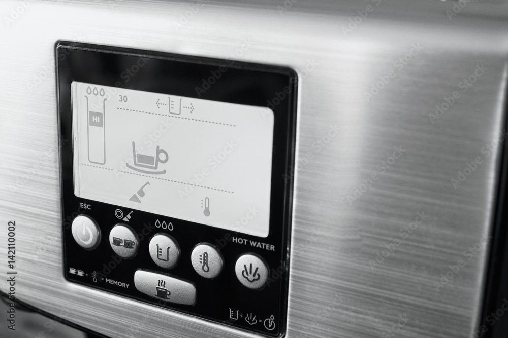 Photo of a black and white button in a coffee machine. Configuration ...