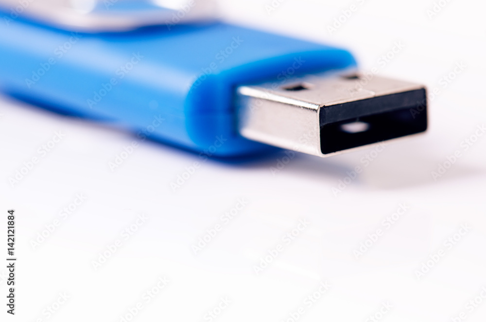 Detail of Usb flash drive on a white background. Flash drive is located ...