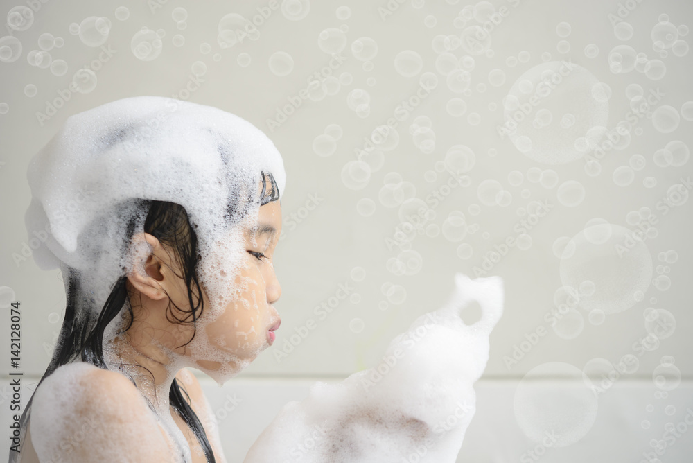 Little Asian girl take a bath Stock Photo | Adobe Stock