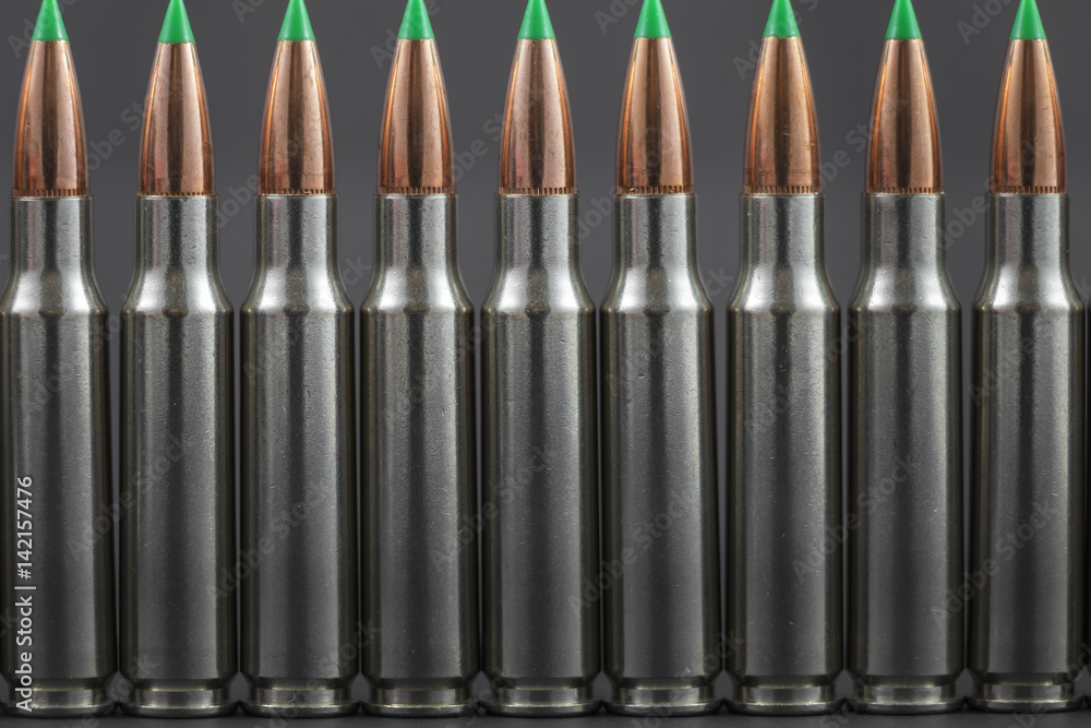 Several rifle bullets ballistic tip Stock Photo | Adobe Stock