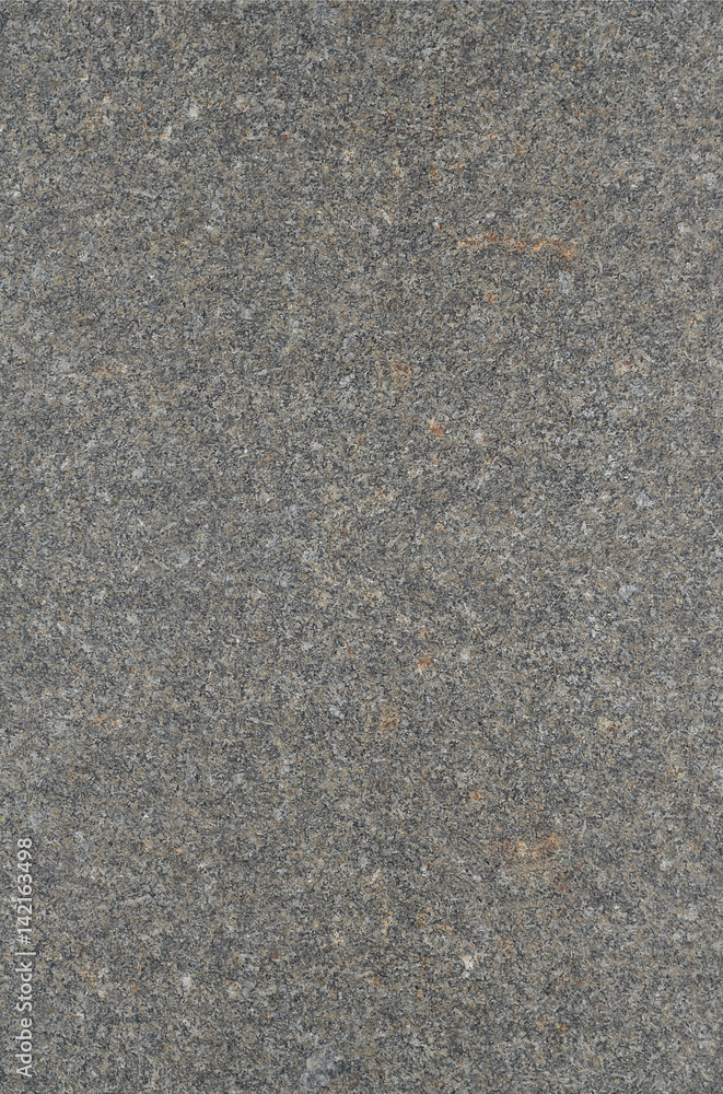 The texture of solid granite tiles. Hard and slippery gray granite ...