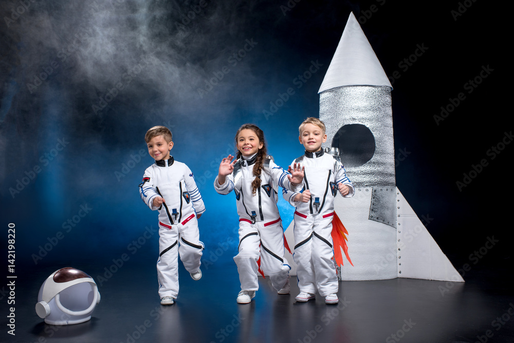 Kids playing astronauts Stock Photo | Adobe Stock