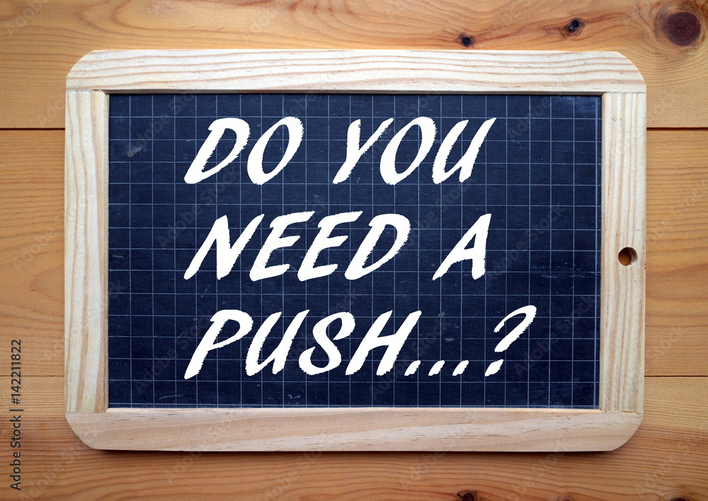 The words Do You Need A Push in white text on a blackboard as a ...
